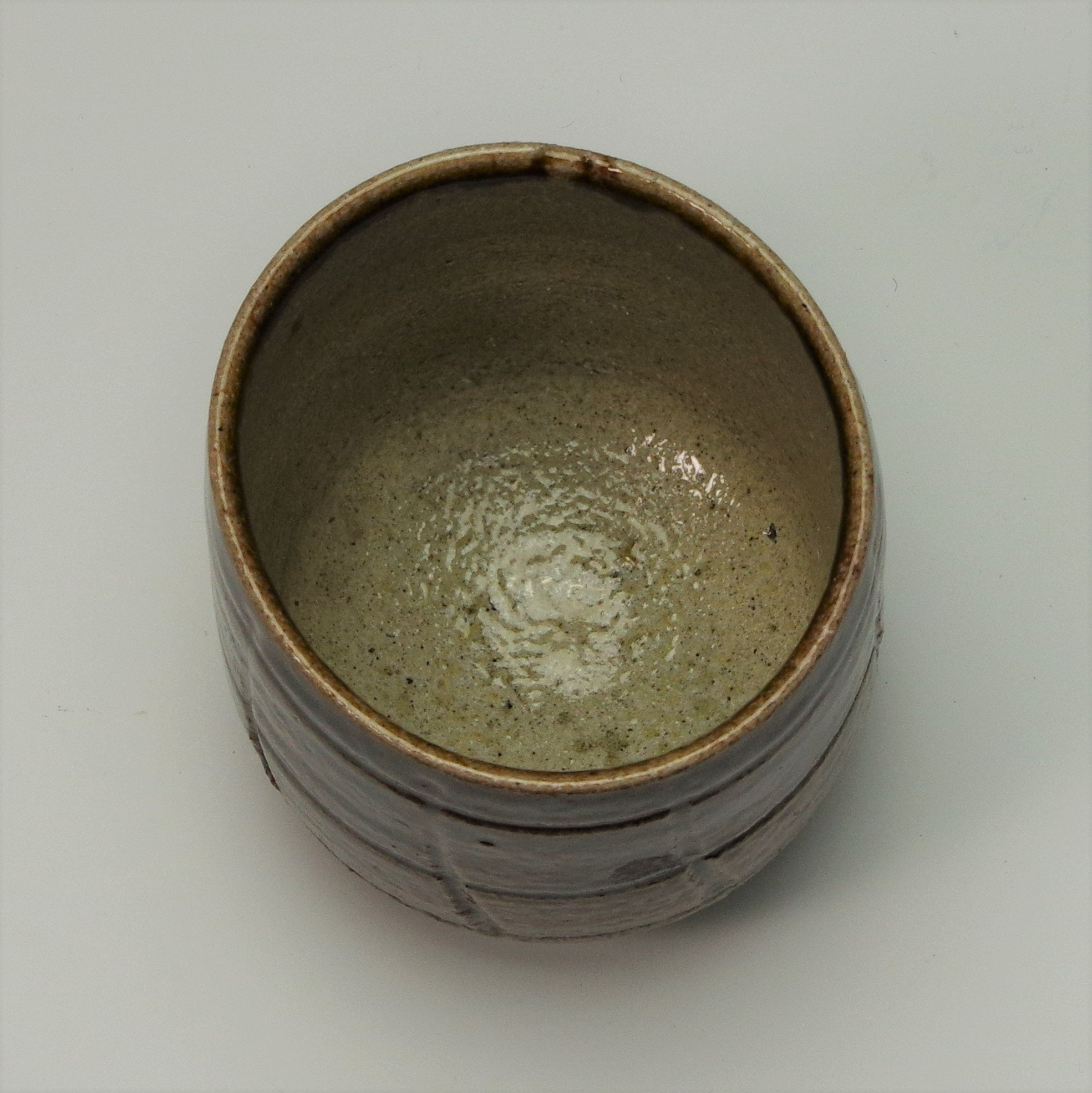 H4-34 | Shoji Hamada "Iron and salt glazed Yunomi with carved ...