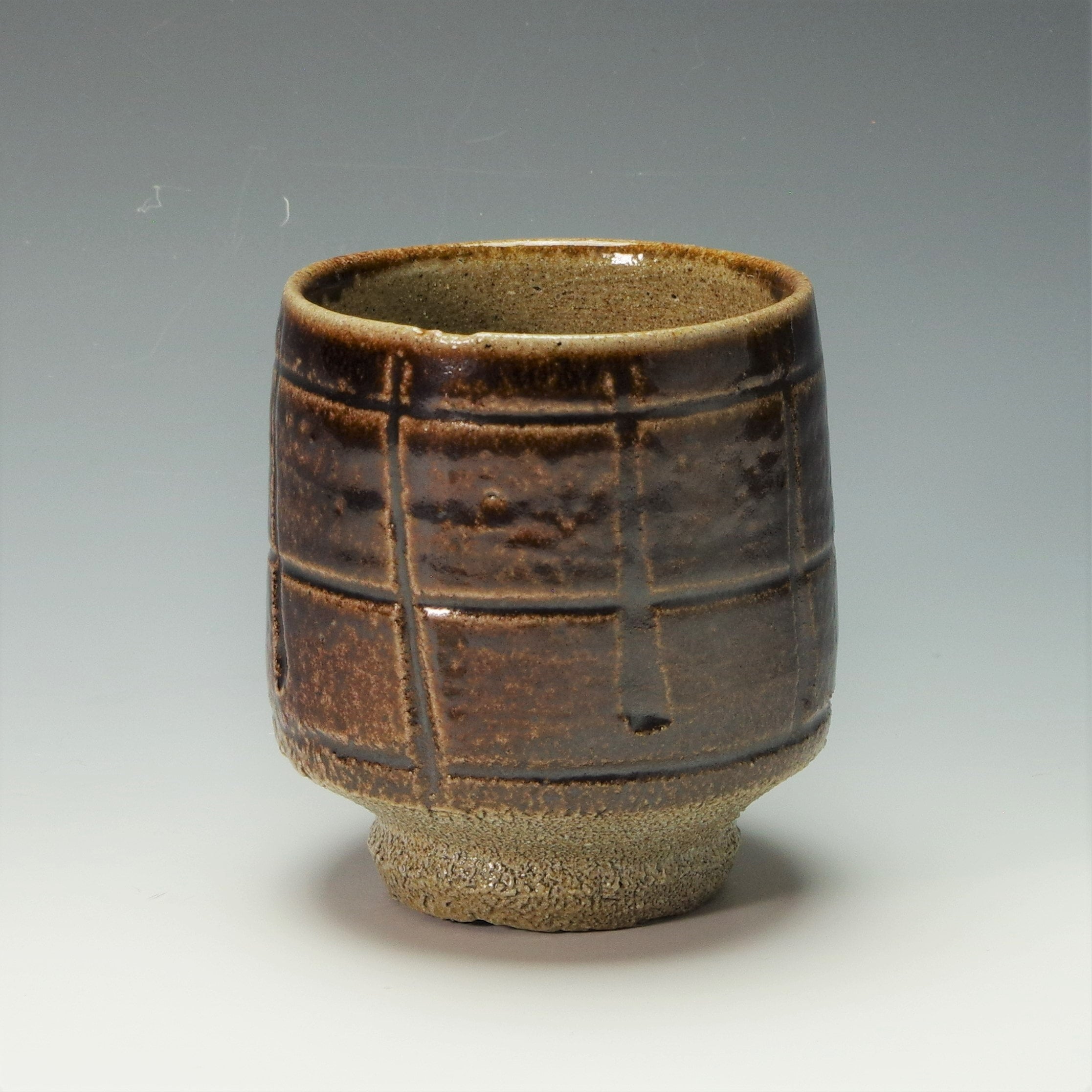 H4-34 | Shoji Hamada "Iron and salt glazed Yunomi with carved ...